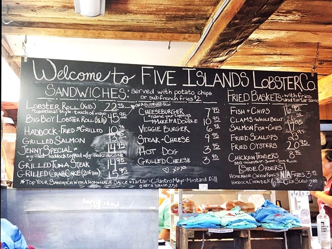 Chalkboard menu: where lobster dreams come true. It's like a love letter to seafood, written in impeccable penmanship.