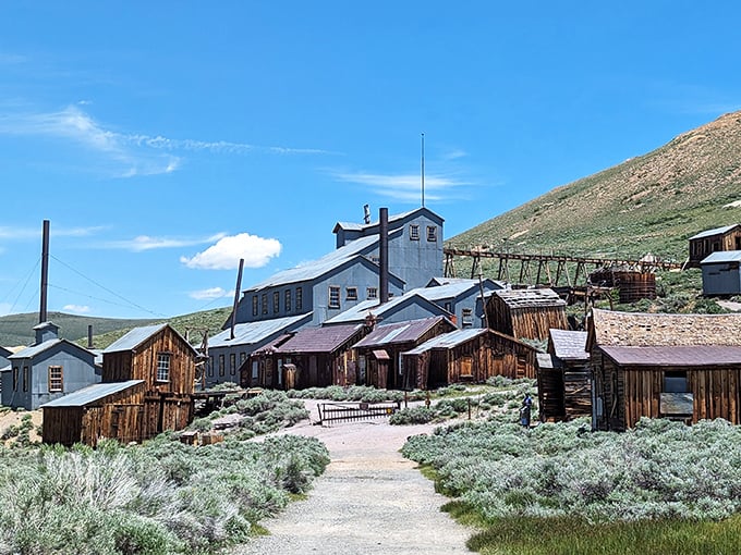 "Where the streets have no name&hellip; but plenty of stories." Wooden structures line a dusty path, inviting visitors to step back in time.