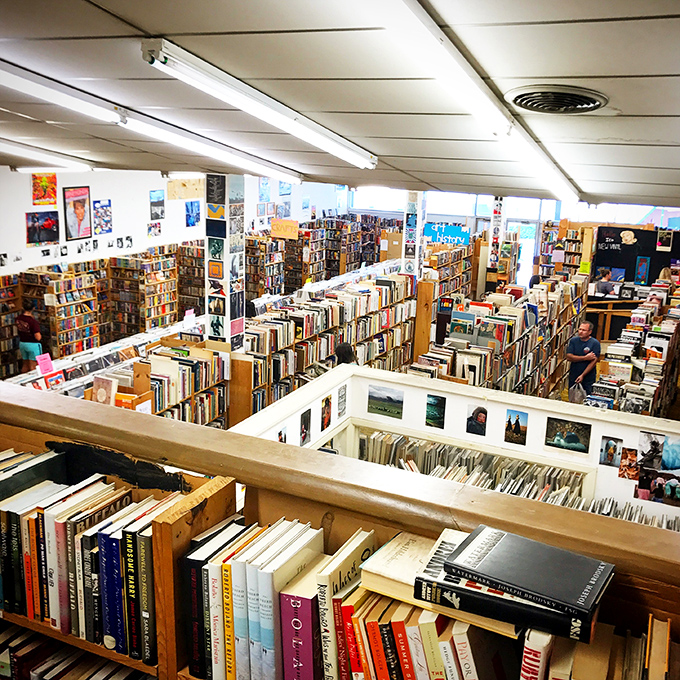 A bird's eye view of paradise! From up here, the store looks like a labyrinth of knowledge, each aisle a new adventure waiting to unfold.