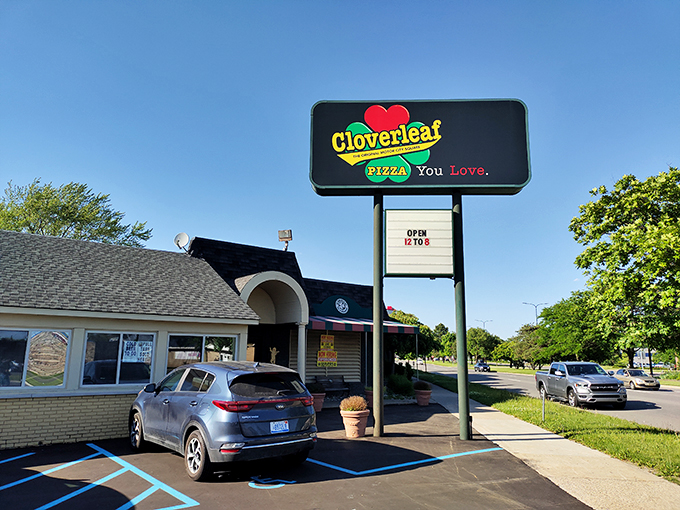Cloverleaf Bar & Restaurant: Where luck meets deliciousness! This unassuming exterior hides a treasure trove of cheesy, saucy goodness that'll make you feel like you've hit the pizza jackpot.