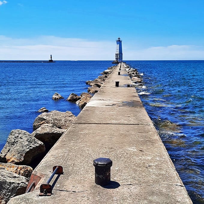 Frankfort's lighthouse stands tall, guarding dreams and selfie-takers alike. Lake Michigan never looked so good!