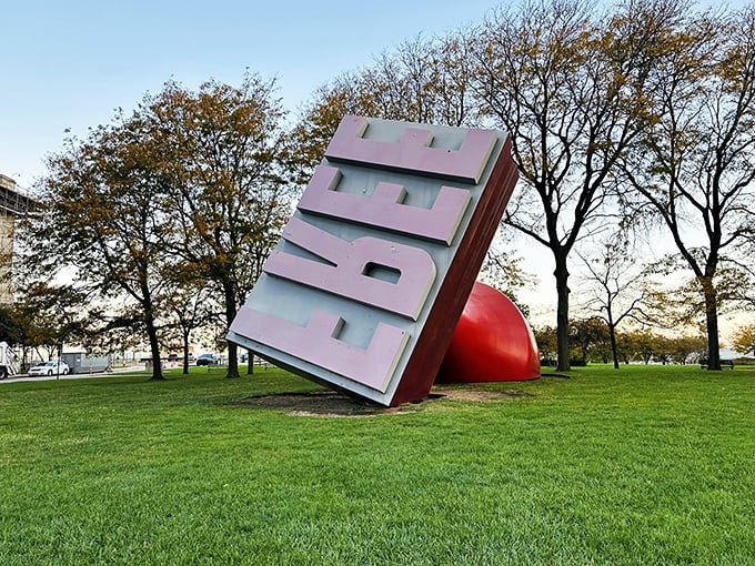 Free Stamp: Looks like someone's "APPROVED" stamp went rogue! This pop art behemoth lounges casually, ready to endorse skyscrapers or entire city blocks.