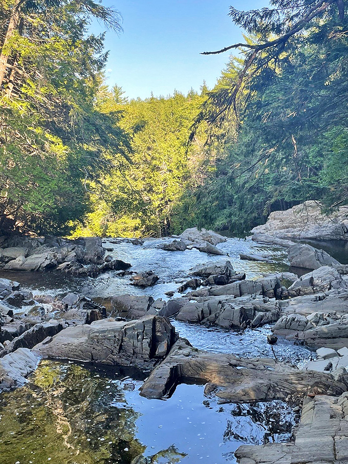 Houston Brook Falls: Proving that everything's bigger in... Maine? This multi-tiered marvel is like nature's version of a layer cake.