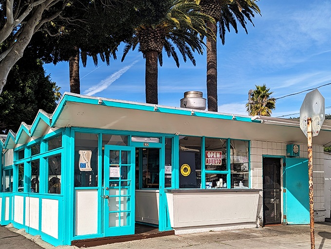 La Super-Rica Taqueria: Teal dreams and tasty schemes! This humble shack holds more flavor than a telenovela has drama.