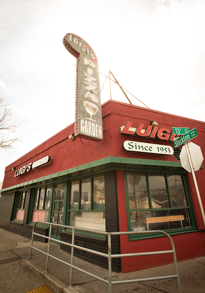Luigi's Pizza Parlor: Serving up nostalgia by the slice since 1953. That sign's been guiding pizza pilgrims for generations.