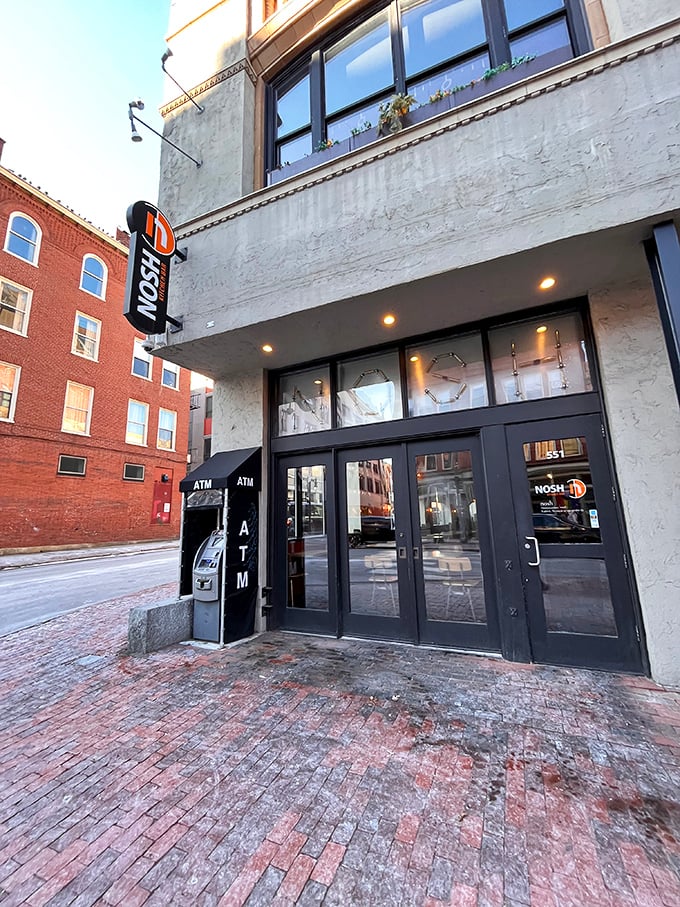 Nosh Kitchen Bar: Where burgers get their PhD in deliciousness. It's like the cool kid in school who's actually nice to everyone.