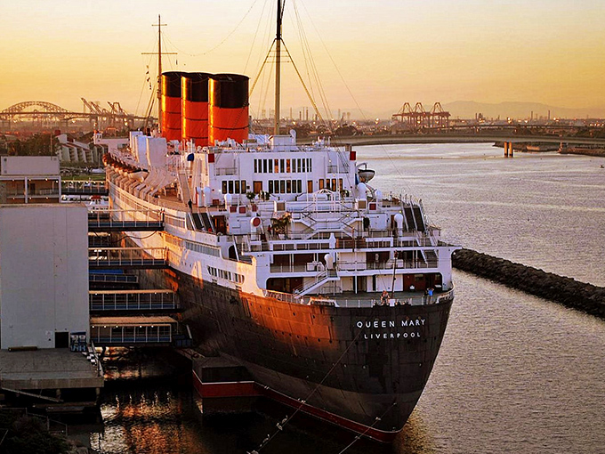 All aboard the Queen Mary, where "floating hotel" meets "ghostly getaway." It's like "The Love Boat" crossed with "The Shining" – seasickness optional!