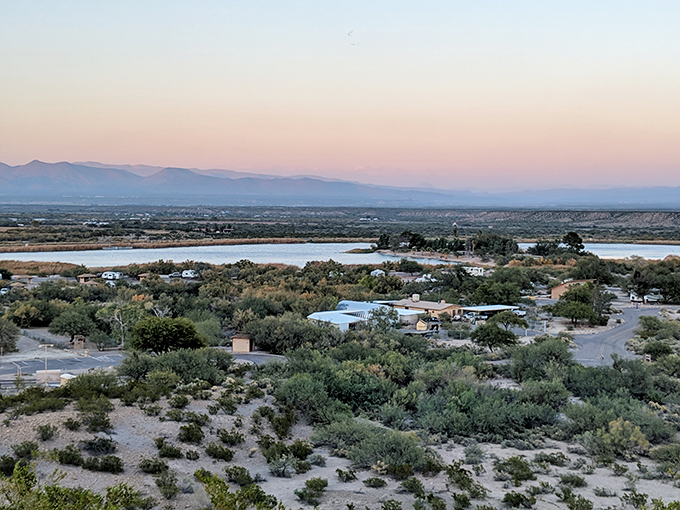 Roper Lake: Where mountains meet mirrors. The still waters reflect the landscape so perfectly, you'll wonder which way is up!