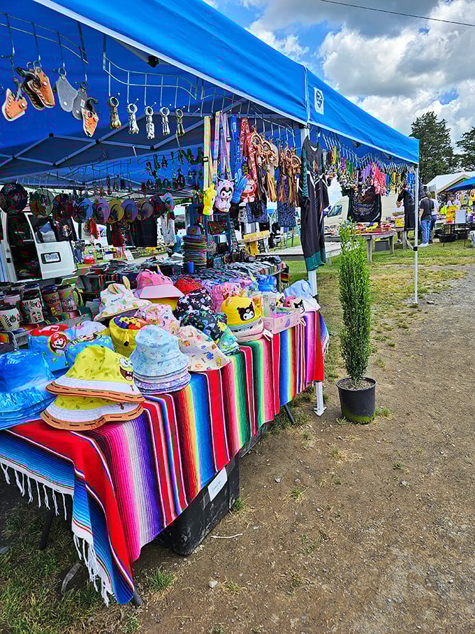 Rainbow connection! This vibrant vendor's stall is like if Kermit the Frog opened a souvenir shop in the heart of Virginia.