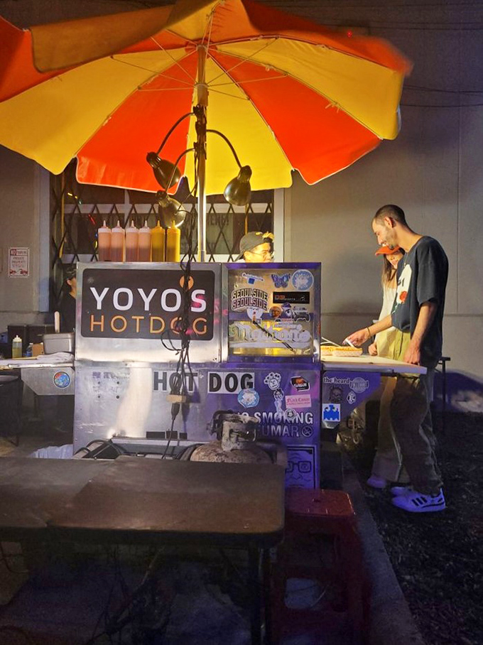 Yoyo's Hotdog: Houston's late-night beacon of hope. Under that cheery umbrella, hot dog dreams come true faster than you can say "extra onions."