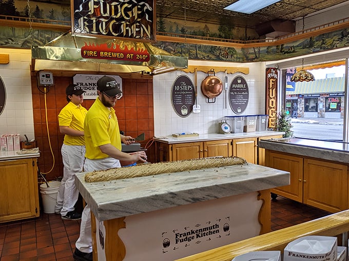 Witness confectionery magic in action! These fudge artisans are like the Michelangelos of the sweet world, but their medium melts in your mouth.