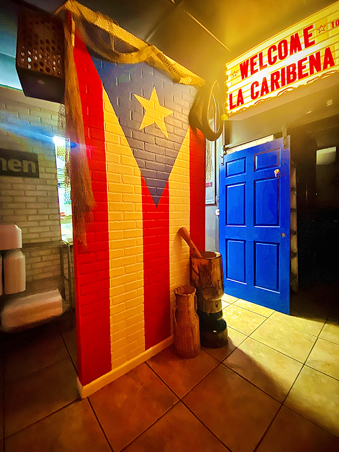 Welcome to flavor town! La Caribe&ntilde;a's vibrant interior mural sets the stage for a Caribbean feast.