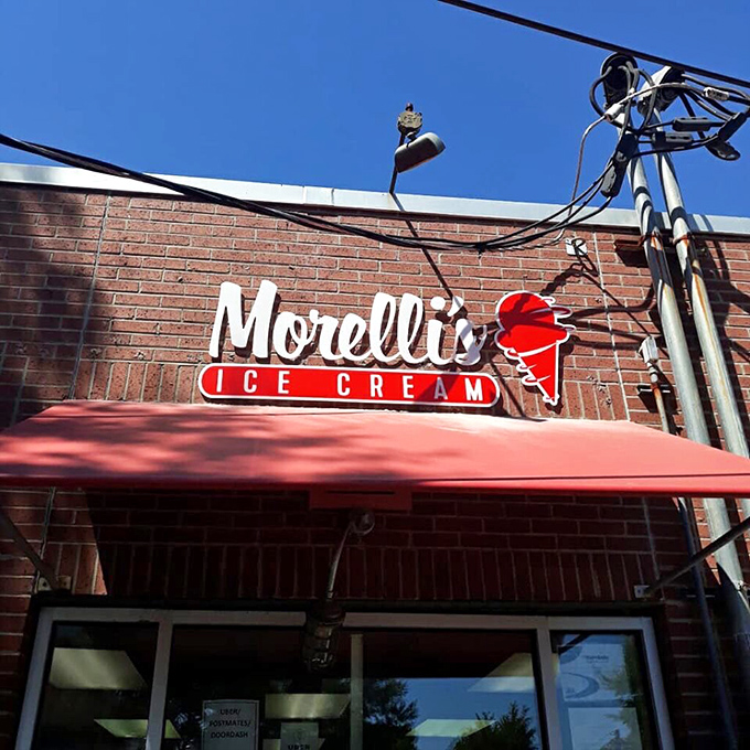 Ice cream artistry in action. Morelli's sign promises gourmet scoops that'll have you contemplating a career change to professional taster.