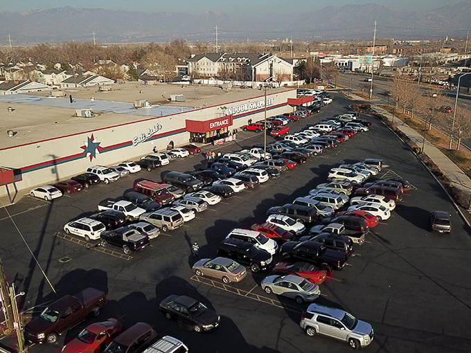 Parking lot packed with potential. This isn't just shopping; it's an expedition into the unknown realms of "maybe I'll use it someday."