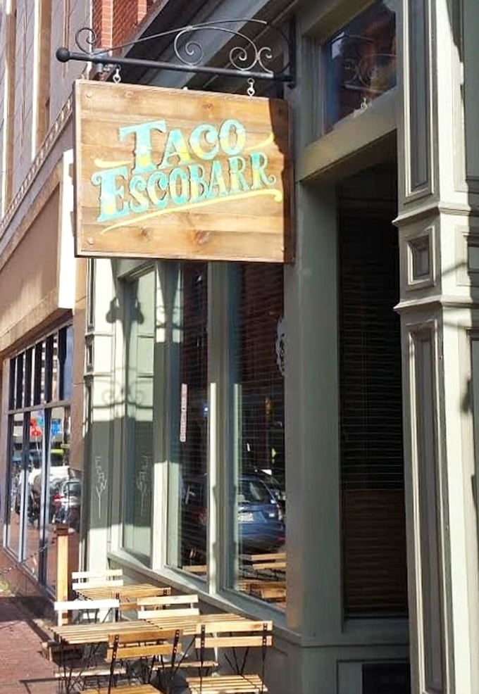 Who needs a passport? Taco Escobarr's wooden sign is your ticket to flavor town, right in the heart of Portland.