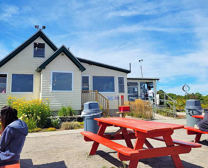 Bright flowers welcome hungry visitors to The Lobster Shack at Two Lights, where picnic tables await with ocean panoramas.