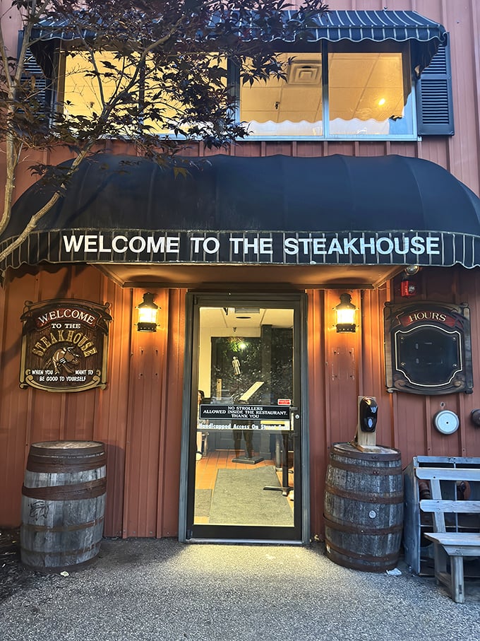 Welcome to steak paradise! The Steakhouse's warm glow and rustic barrels promise an evening of carnivorous delights.