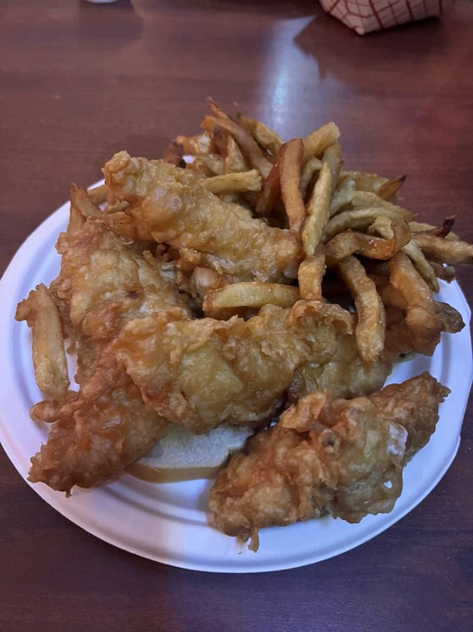 Golden-brown perfection on a plate. These chicken tenders and fries are the comfort food equivalent of a warm hug.