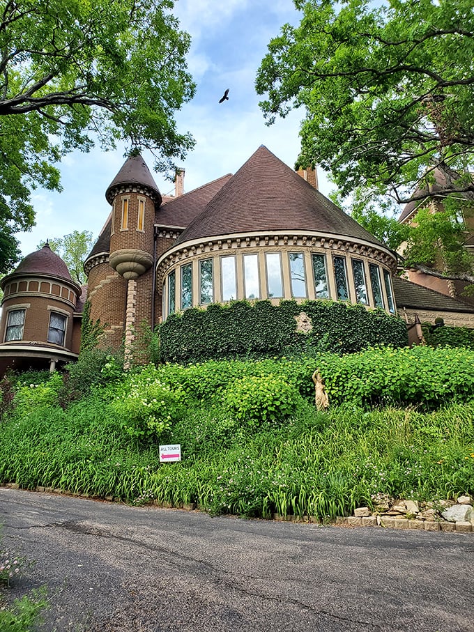 Nature's red carpet welcome: Ivy-clad walls and vibrant flowers set the stage for your grand entrance to castle life.