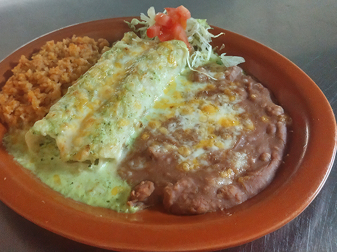 Green enchiladas that could make Kermit jealous! These cheese-smothered beauties are a fiesta on a plate.