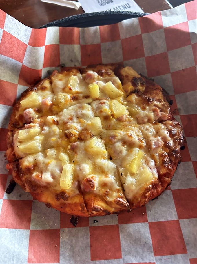 Aloha, taste buds! This Hawaiian pizza is bringing the luau to Illinois. Who knew paradise was just a slice away?