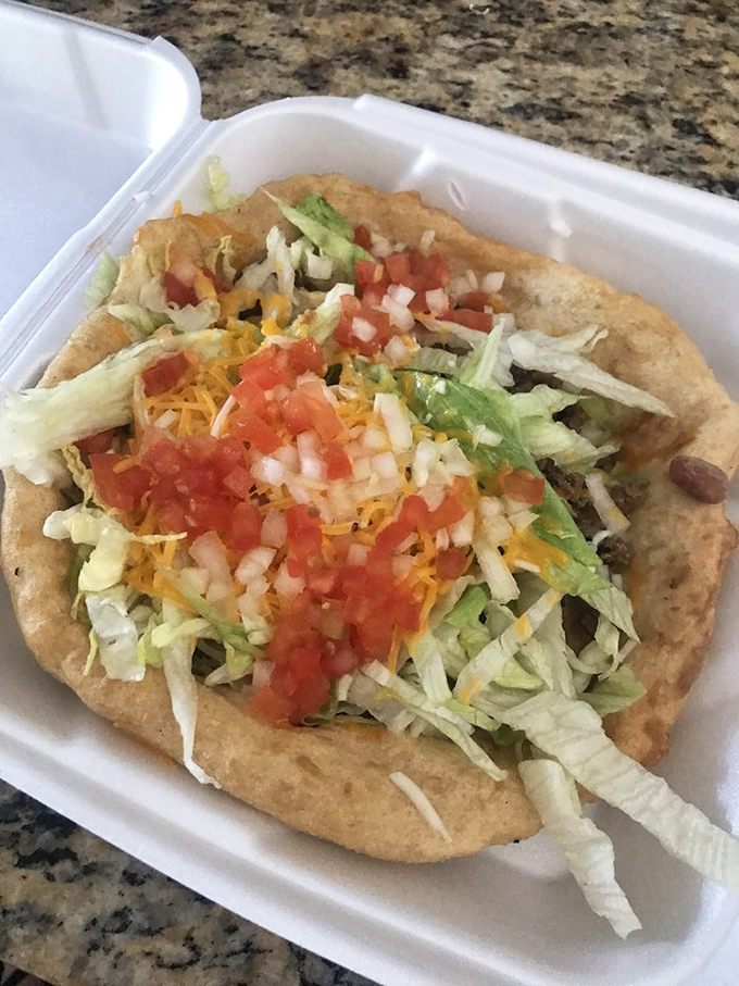 Behold, the Indian taco in all its glory! It's a flavor fiesta that'll make your taste buds do the cha-cha.