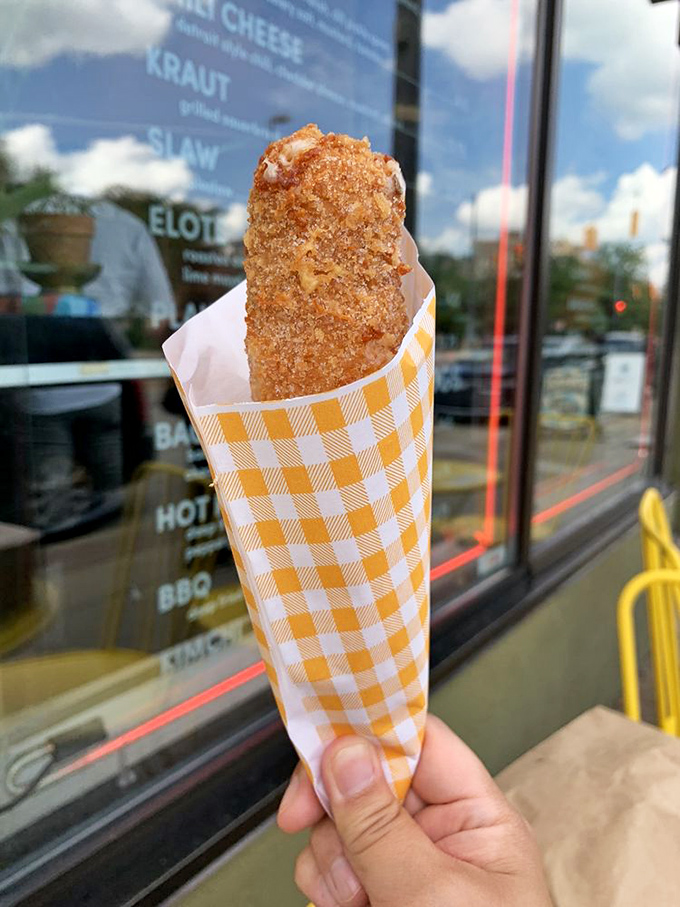 Behold, the Korean corn dog in all its golden glory! It's like a state fair favorite got a passport and came back worldly.
