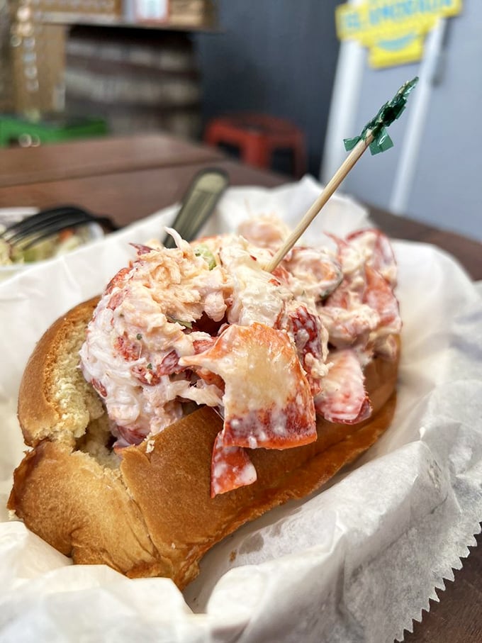 Behold, the lobster roll of your dreams! This beauty is so packed with succulent lobster, it's practically doing the backstroke in that buttery bun.