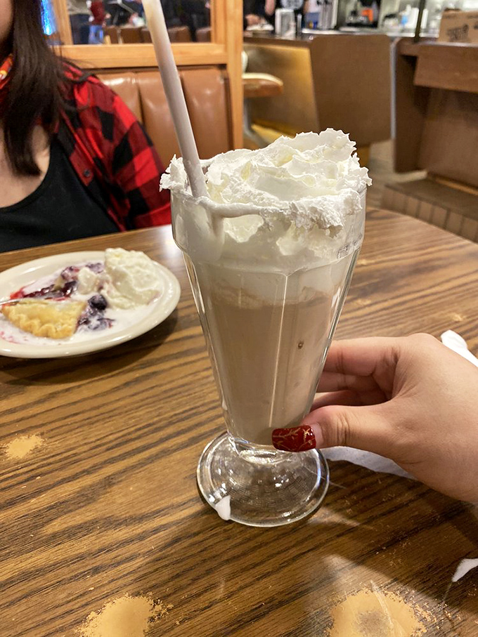Holy moo juice, Batman! This chocolate malt is thicker than the plot of a noir film and twice as satisfying.
