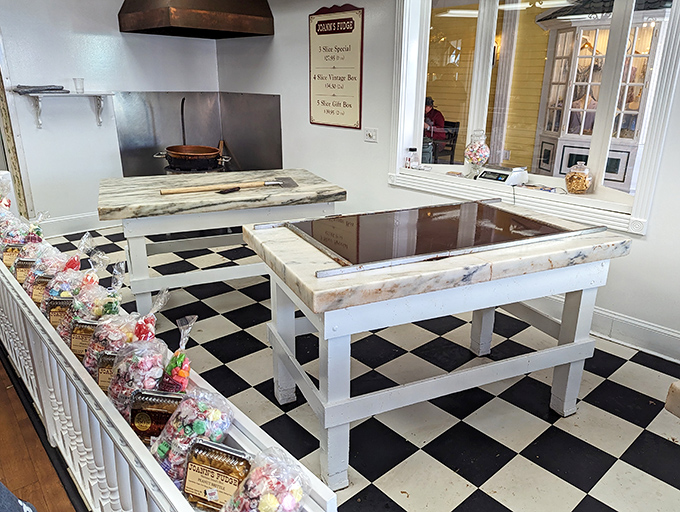 Behold, the altar of sweetness! This marble slab is where fudge dreams come true, one paddle-swirl at a time.