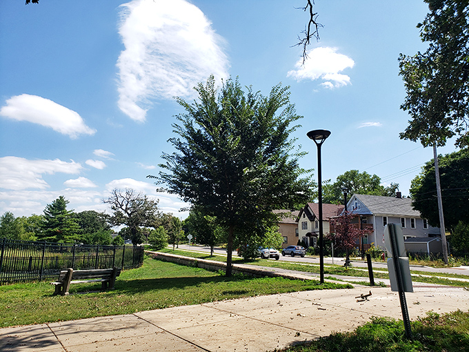 Nature's waiting room! These inviting benches offer front-row seats to Minneapolis's own slice of paradise. Perfect for sunbathing or people-watching between dips.