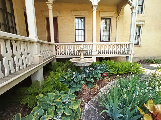 Nature meets nurture on this charming porch. The perfect spot for sipping lemonade and pretending you're in a Jane Austen novel.
