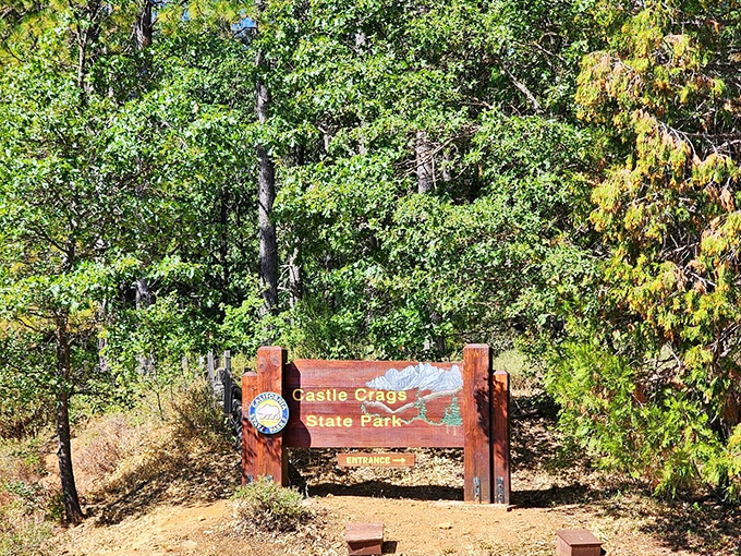 "Welcome to Castle Crags," the sign says. But really, it should read, "Prepare for jaw-dropping, Instagram-breaking, nature-induced euphoria ahead!"
