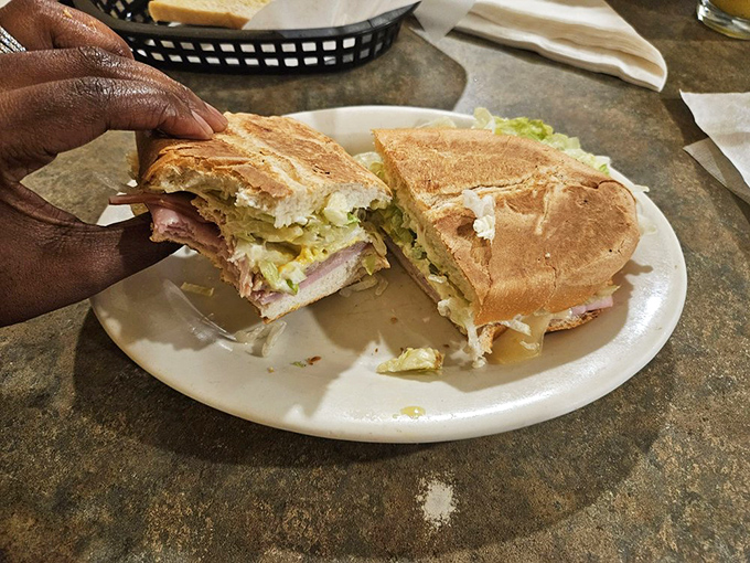 Sandwich perfection in miniature! This little Cuban is proof that good things come in small packages. It's a flavor fiesta in every bite.