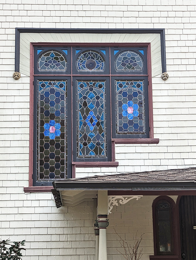 Stained glass that puts kaleidoscopes to shame. These windows are the mansion's crown jewels, no tiara required.