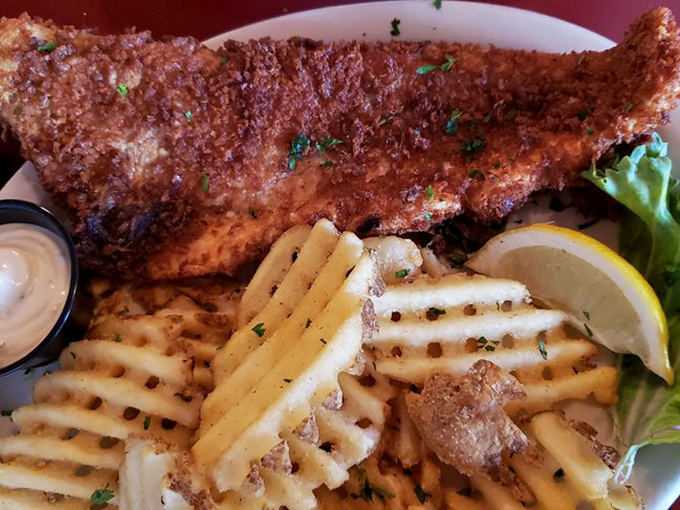 This isn't just fish and chips, it's a golden-crusted ticket to flavor town. Crispy, flaky, and ready for its close-up!