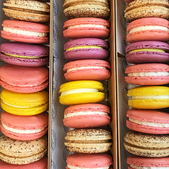Macarons that could make even Marie Antoinette say, "Let them eat cookies!" A rainbow of flavors that'll make your taste buds do a happy dance.