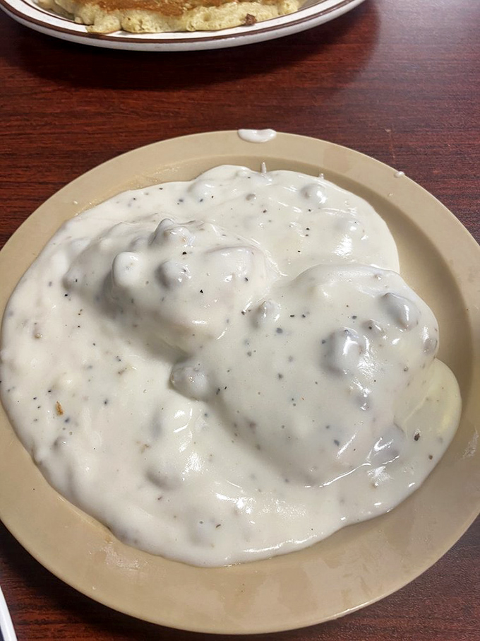 Behold, the holy grail of comfort food! This biscuits and gravy could make even the Pillsbury Doughboy weep with joy.