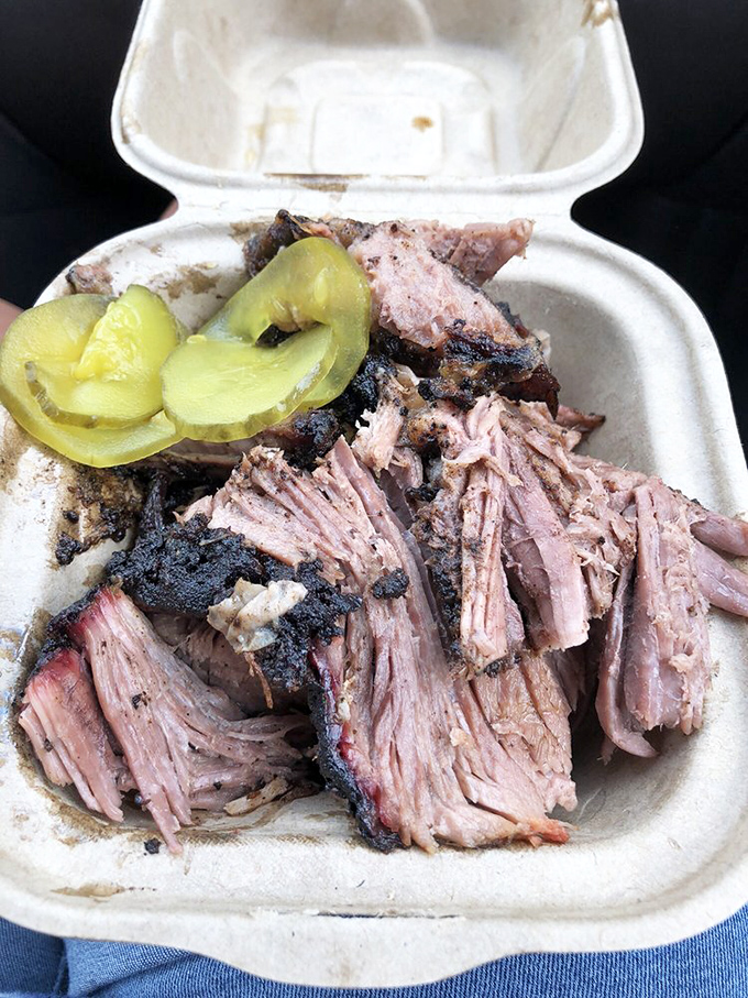 Talk about a meat masterpiece! This brisket's got more bark than a lumberjack convention and enough juiciness to make your napkin weep.