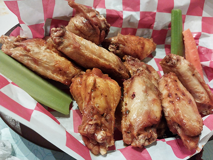 Wings that make you want to fly! These golden-brown beauties are like the Beyoncé of bar food - they slay every time.