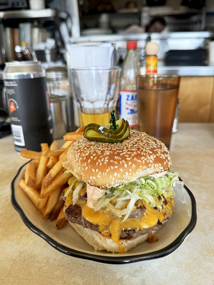 Holy cow, that's a burger! This bad boy could make even the Hamburglar go straight. Fries on the side? Don't mind if I do!
