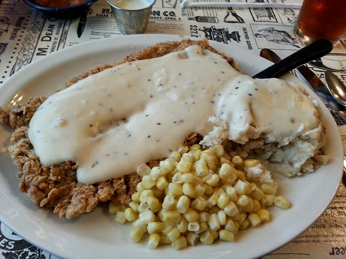 Holy gravy, Batman! This chicken fried steak is so smothered, it could moonlight as a life raft. Comfort food that hugs your insides!