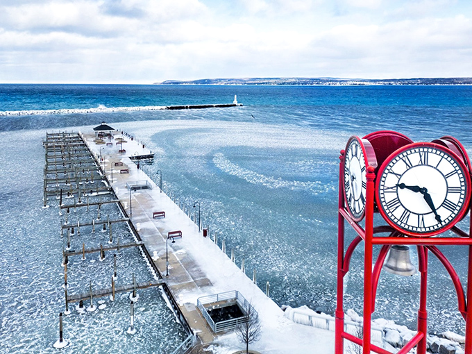 Frozen in time: Petoskey's iconic clock tower stands sentinel over a partially frozen bay. It's like Mother Nature hit the pause button on perfection.