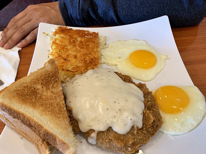 The breakfast of champions… and those who aspire to be! This country-fried steak could make a rooster crow with delight.