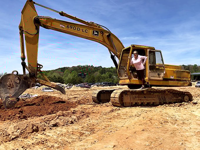 Move over, sandbox toys! This excavator's the ultimate grown-up plaything. It's like a giant claw machine, but way more satisfying.
