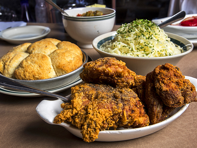Behold, the holy grail of comfort food! Golden-brown chicken, fluffy biscuits, and sides that'll make your grandma jealous.