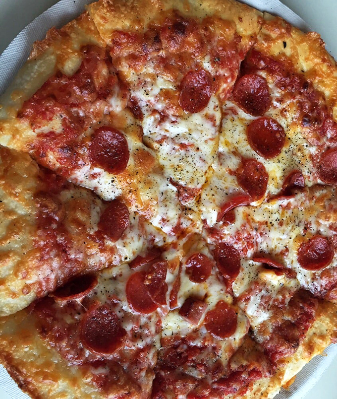 Pepperoni perfection! This Greek-style pizza is so loaded, it could double as a meat lover's dream and a vegetarian's nightmare.