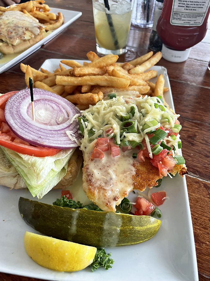 Behold, the Hogfish sandwich! It's like the Elvis of seafood - a little messy, totally indulgent, and guaranteed to leave you all shook up.