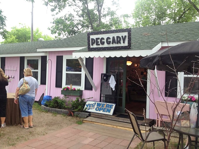 Peg Gary's pink palace of peculiarities. It's like Barbie's dream house grew up, got quirky, and decided to sell its eclectic collection.