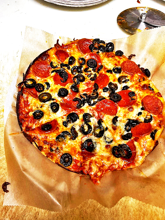 "A pizza so fresh, it might just start a conversation!" This veggie-loaded pie is a colorful masterpiece that'll have you debating: eat it or frame it?